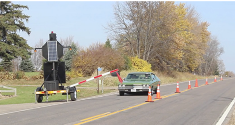 Automatic Flagging Devices Protecting Workers - Traffic Safety Supply ...